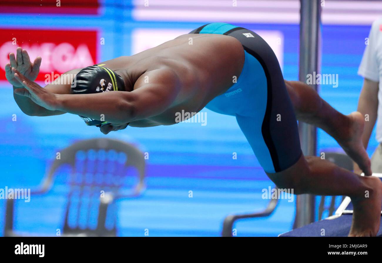 Malawi's Michael Swift starts in his heat of the men's 100m freestyle ...