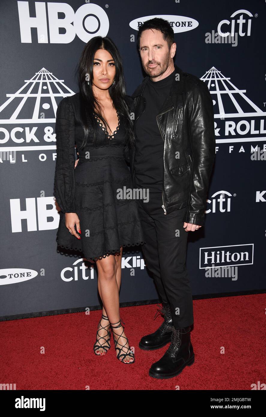Trent Reznor, right, and wife Mariqueen Maandig attend the 2019 Rock ...