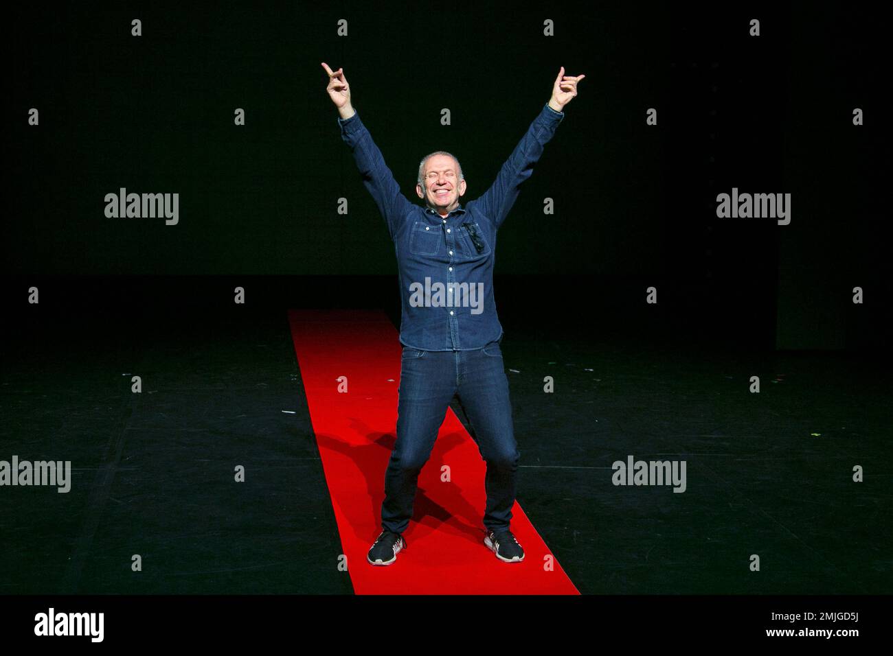 Fashion designer Jean Paul Gaultier poses for photographers at the ...