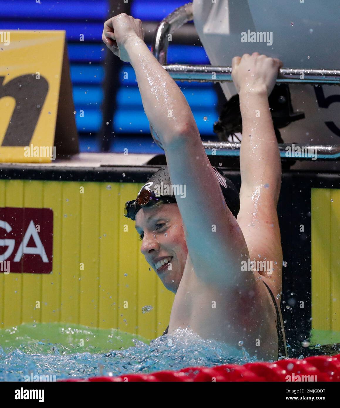 United States' Lilly King celebrates after winning the women's 100m ...