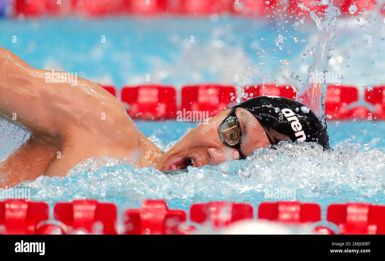 Hong Kong's Ming Ho Cheuk swims in his heat of the men's 800m freestyle ...