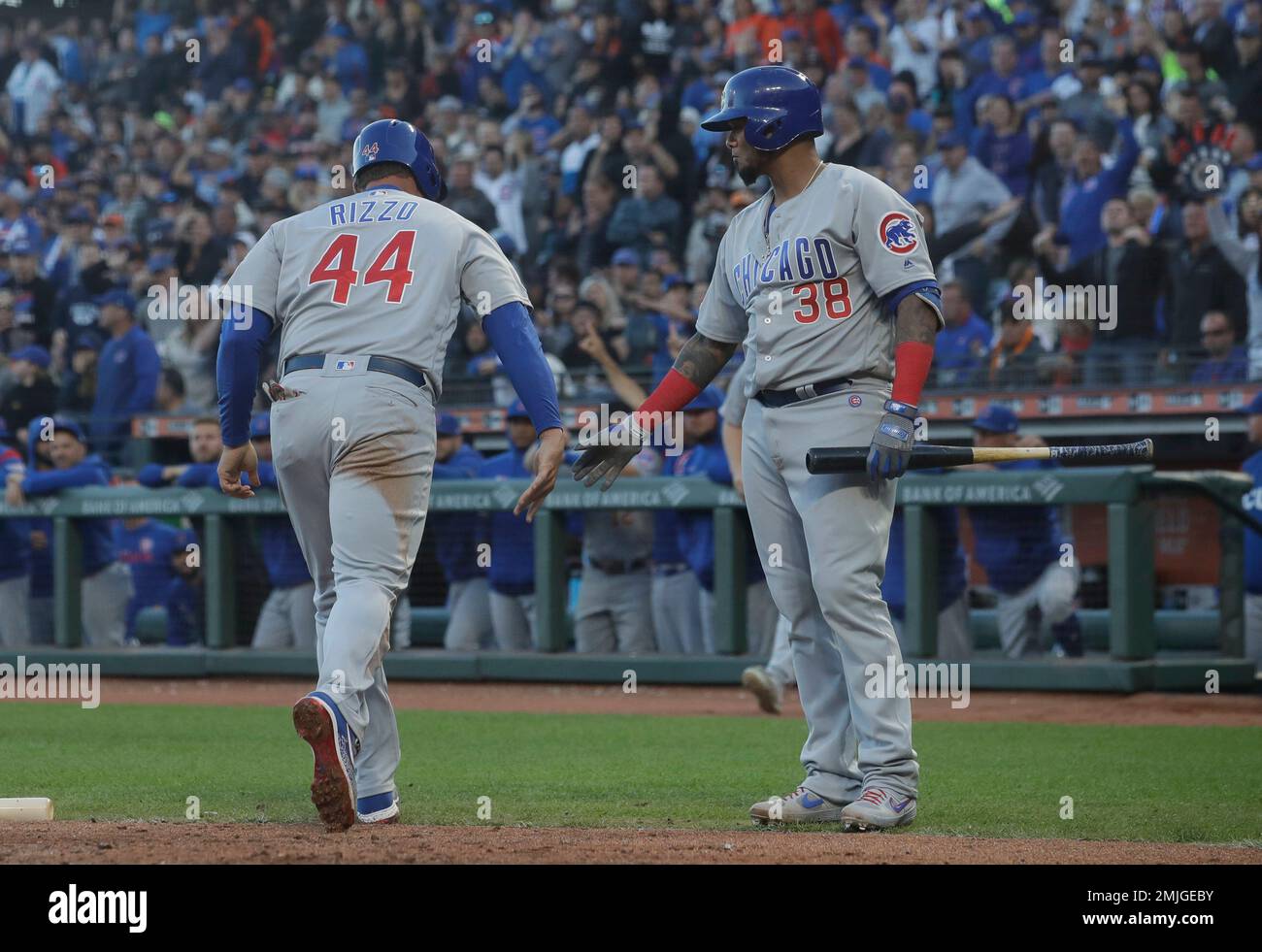 Chicago Cubs' Anthony Rizzo (44) is congratulated by Martin Maldonado ...