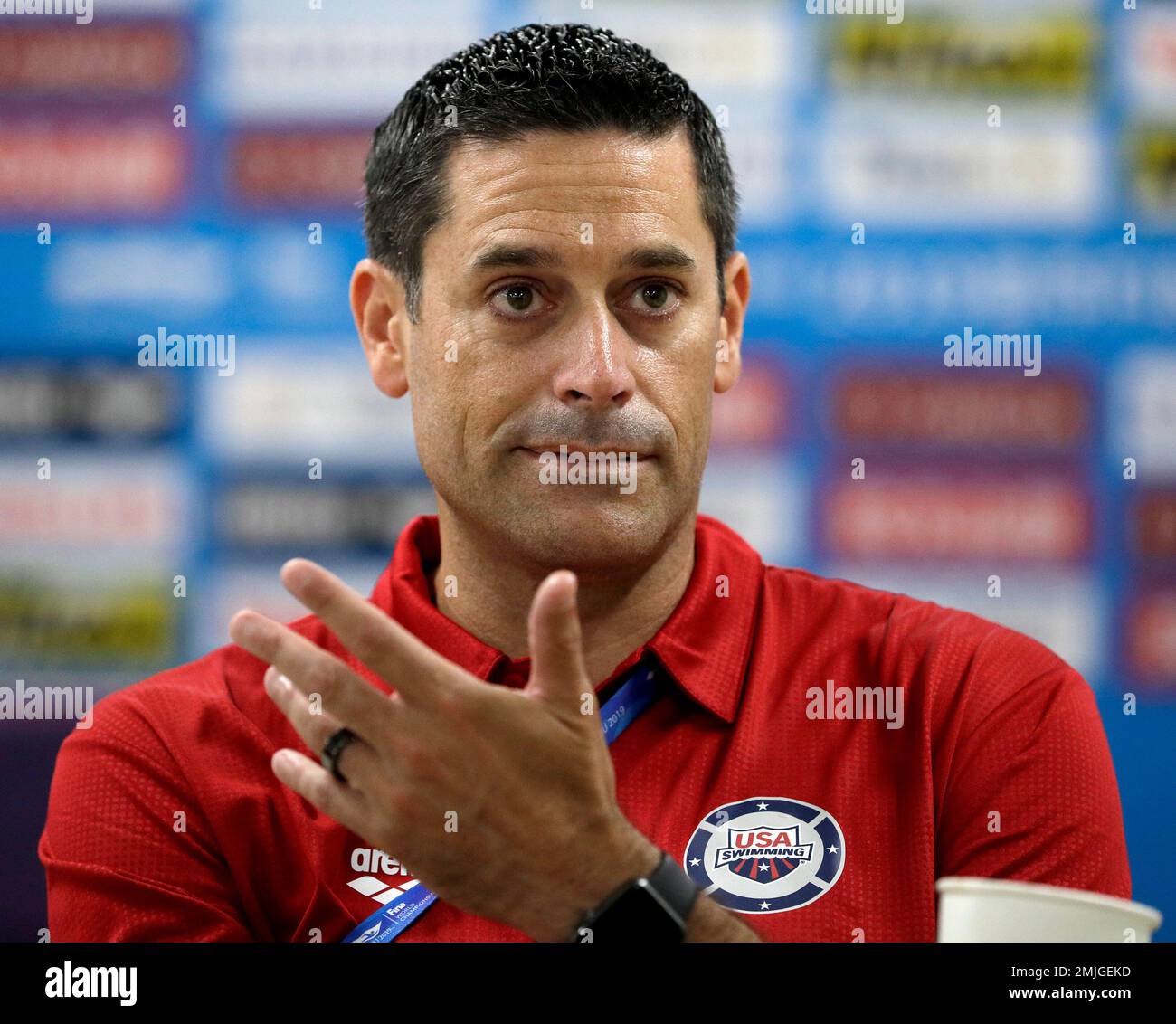 United States swimmer Katie Ledecky's coach Greg Meehan gestures as he ...
