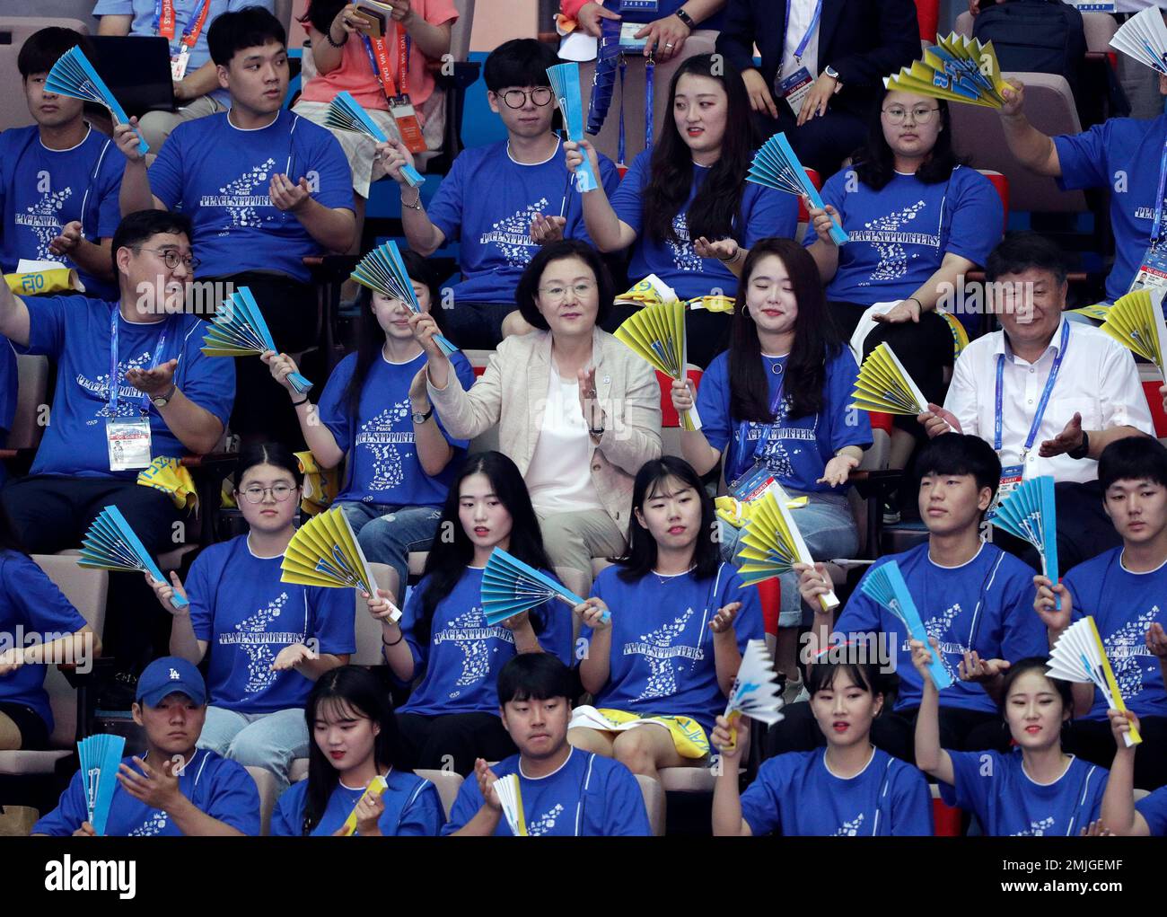 South Korea's first kady, Kim Jung-sook, centre, watches events at the ...