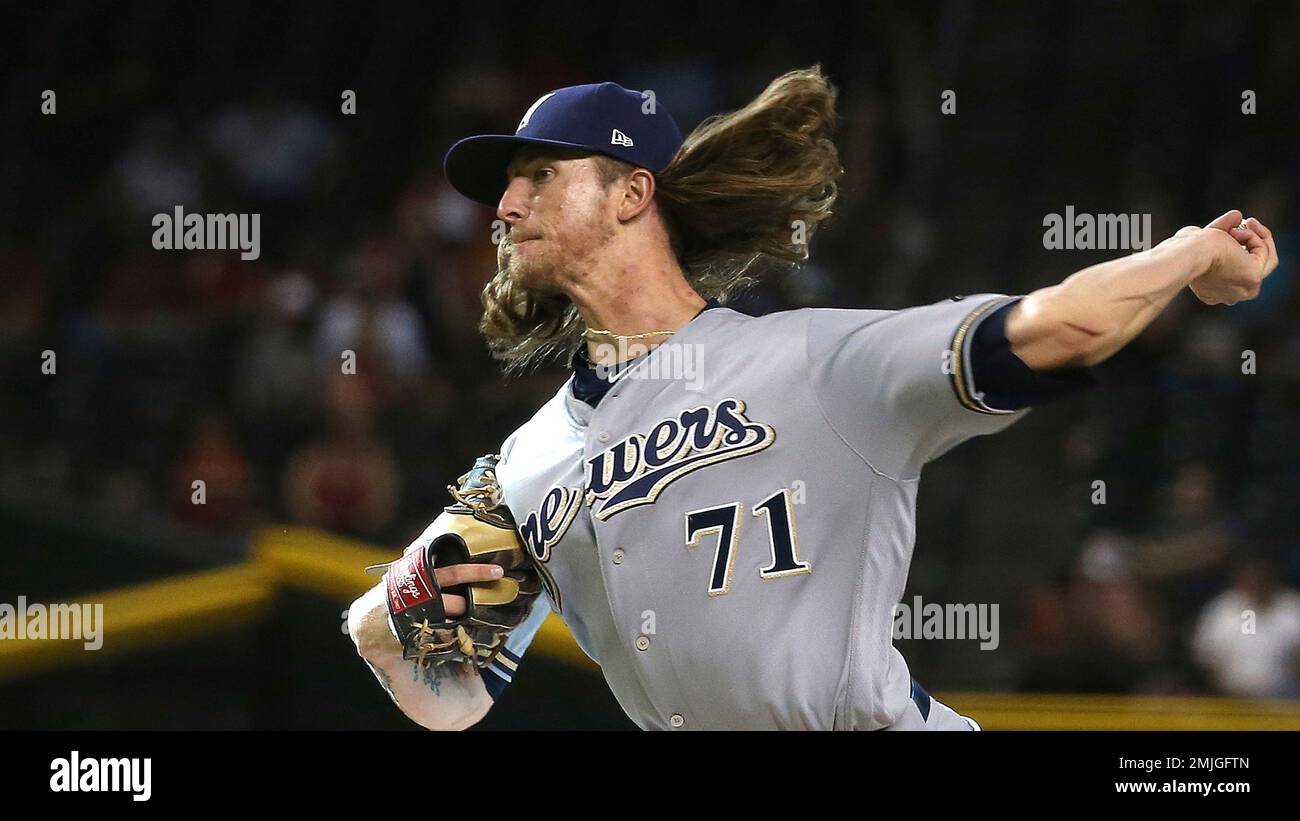 Milwaukee Brewers relief pitcher Josh Hader throws a pitch against the ...