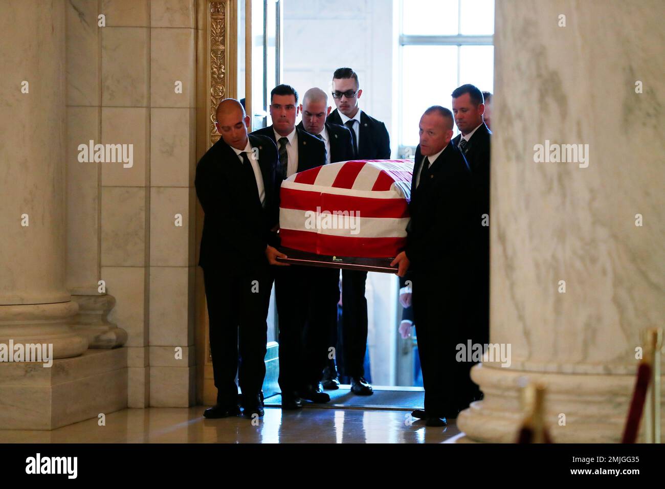 The casket of late Supreme Court Justice John Paul Stevensis carried ...
