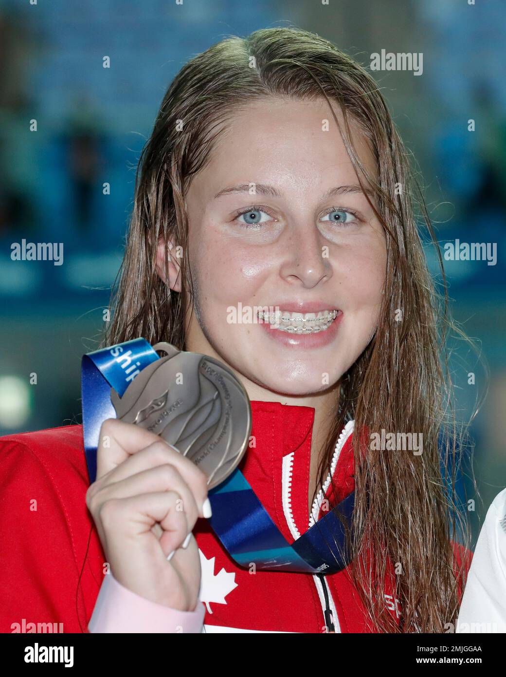 Canada's Sydney Pickrem poses with her bronze medal following the women ...