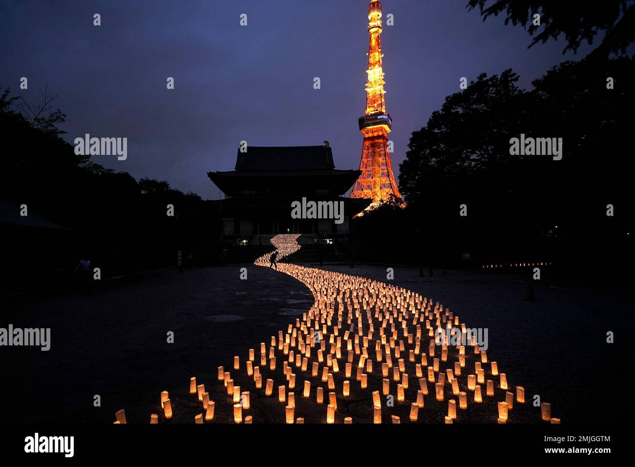 Thousands of candles are arranged in the shape of the Milky Way to ...