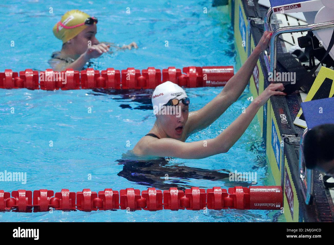 Canada's Taylor Ruck reacts after her women's 100m backstroke heat at ...