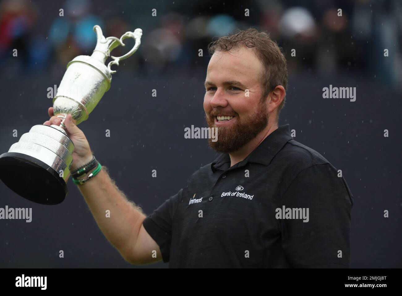 Ireland's Shane Lowry holds Claret Jug trophy as he poses for the media ...