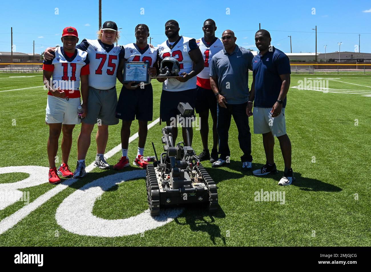 University of Arizona Wildcats football team members pose for a photo ...