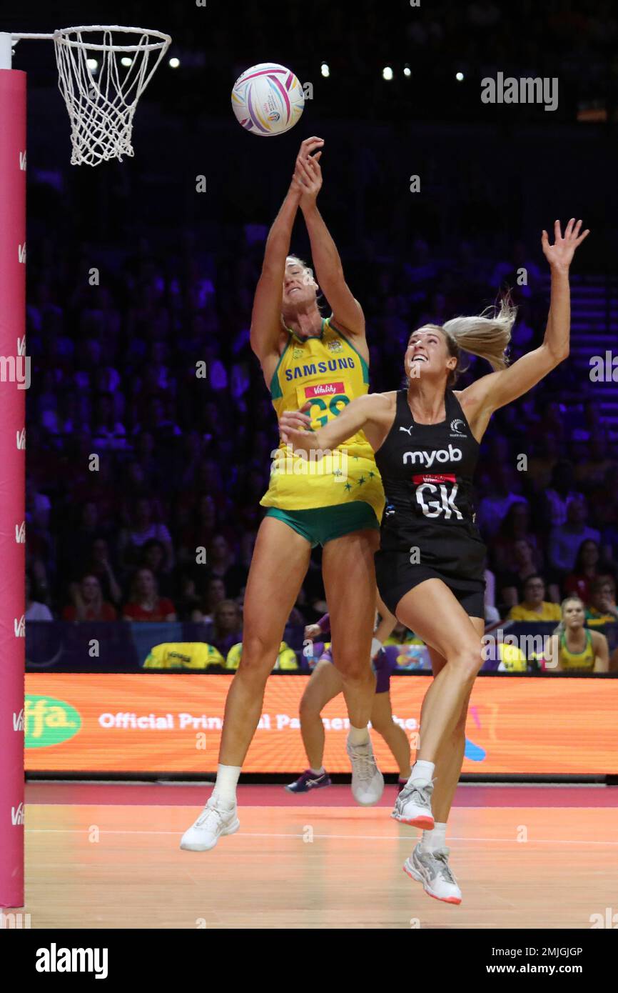 Australia's captain Caitlin Bassett, left, and New Zealand's Jane ...
