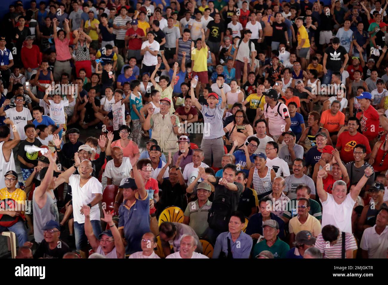 Filipinos cheer as Philippines' Manny Pacquiao floors into the first ...