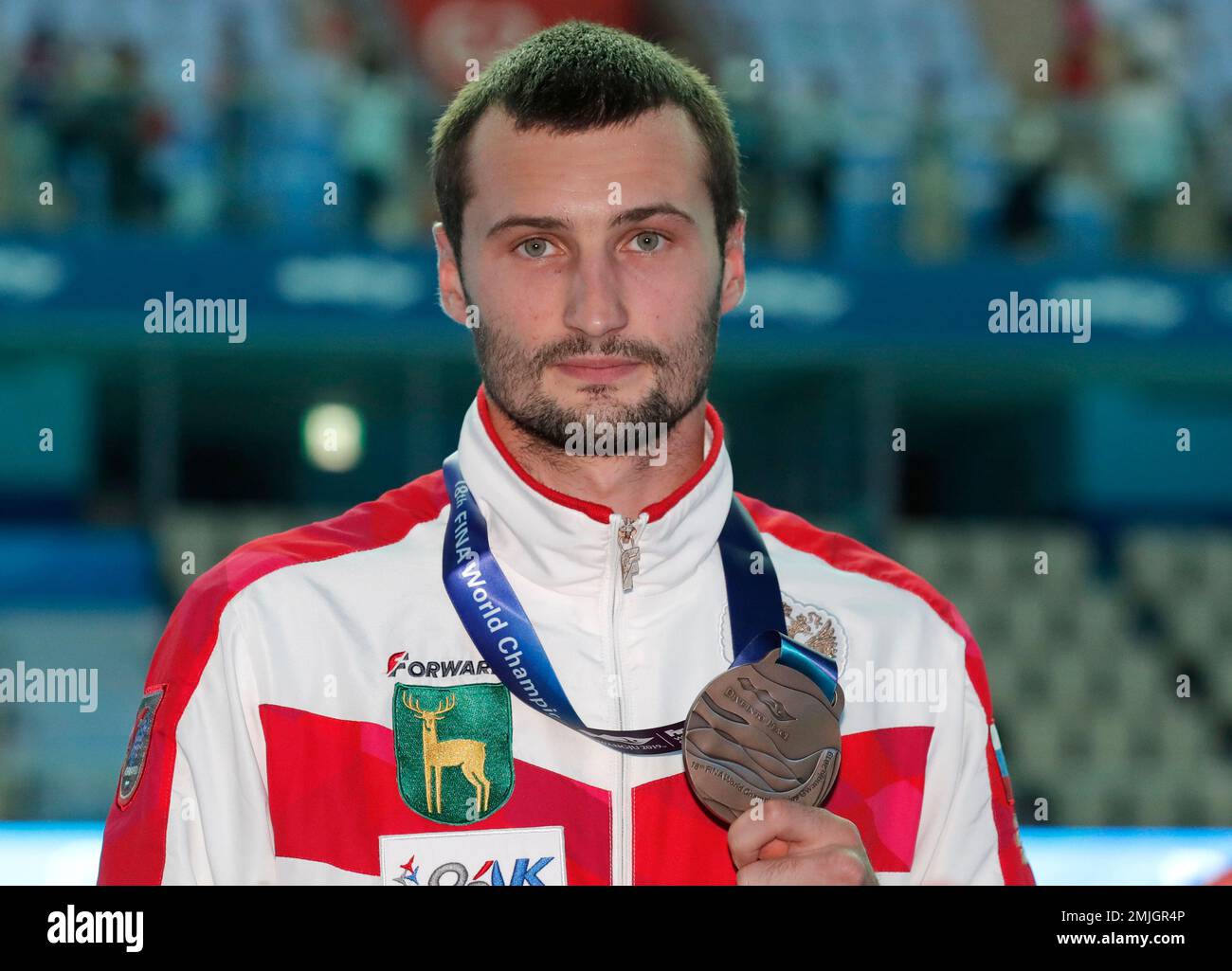 Bronze medalist Russia's Aleksandr Bondar poses with his medal ...