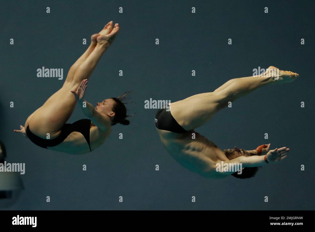 Great Britain's Thomas Daley and Grace Reid compete in the mixed's 3m ...