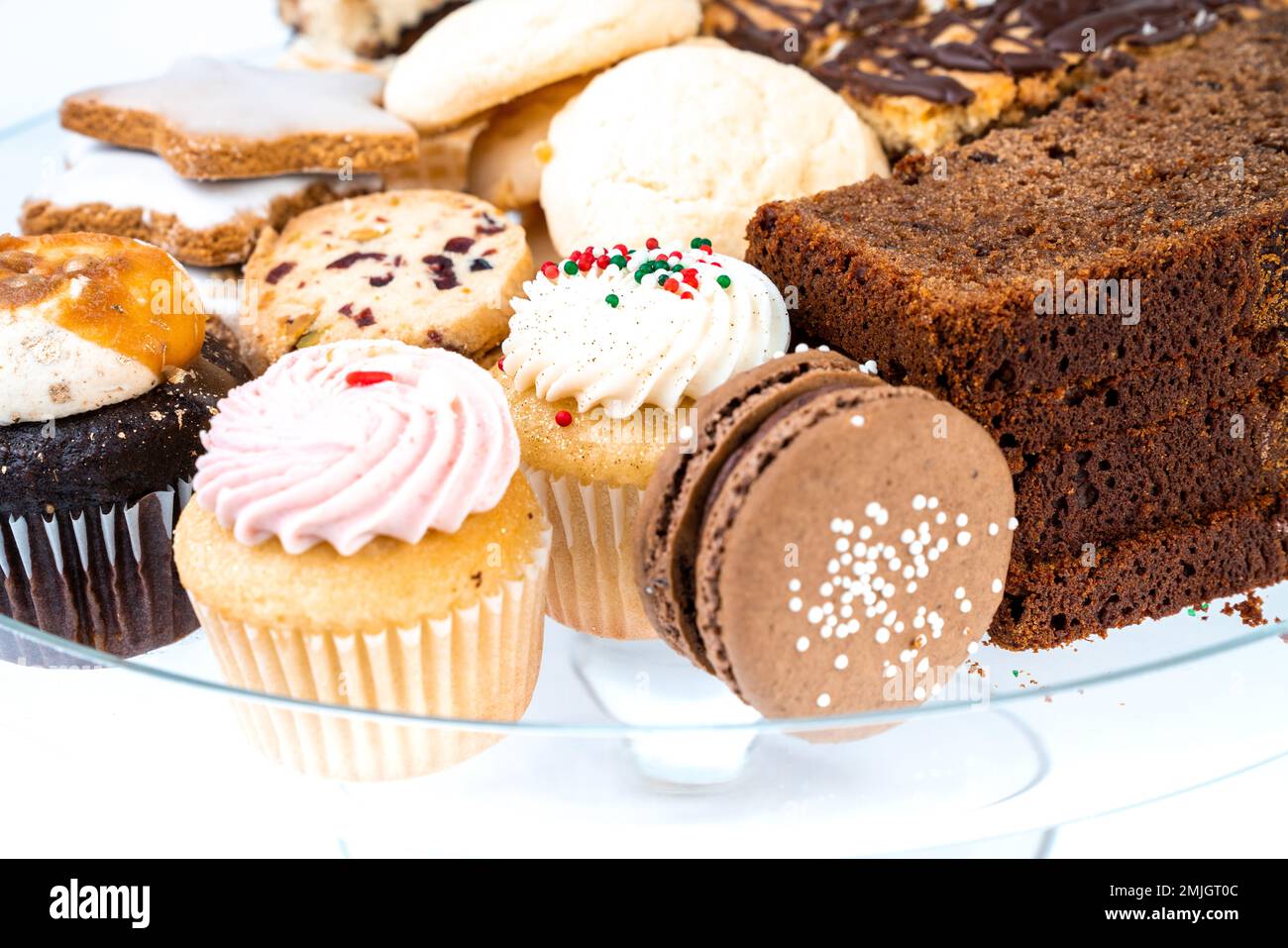Collection of sweet treats on a white background Stock Photo - Alamy