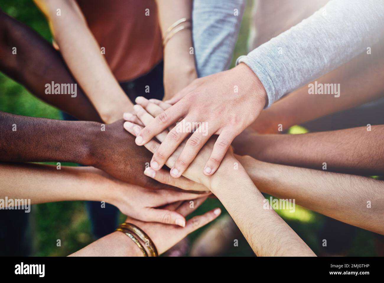 People Joining Hands Together