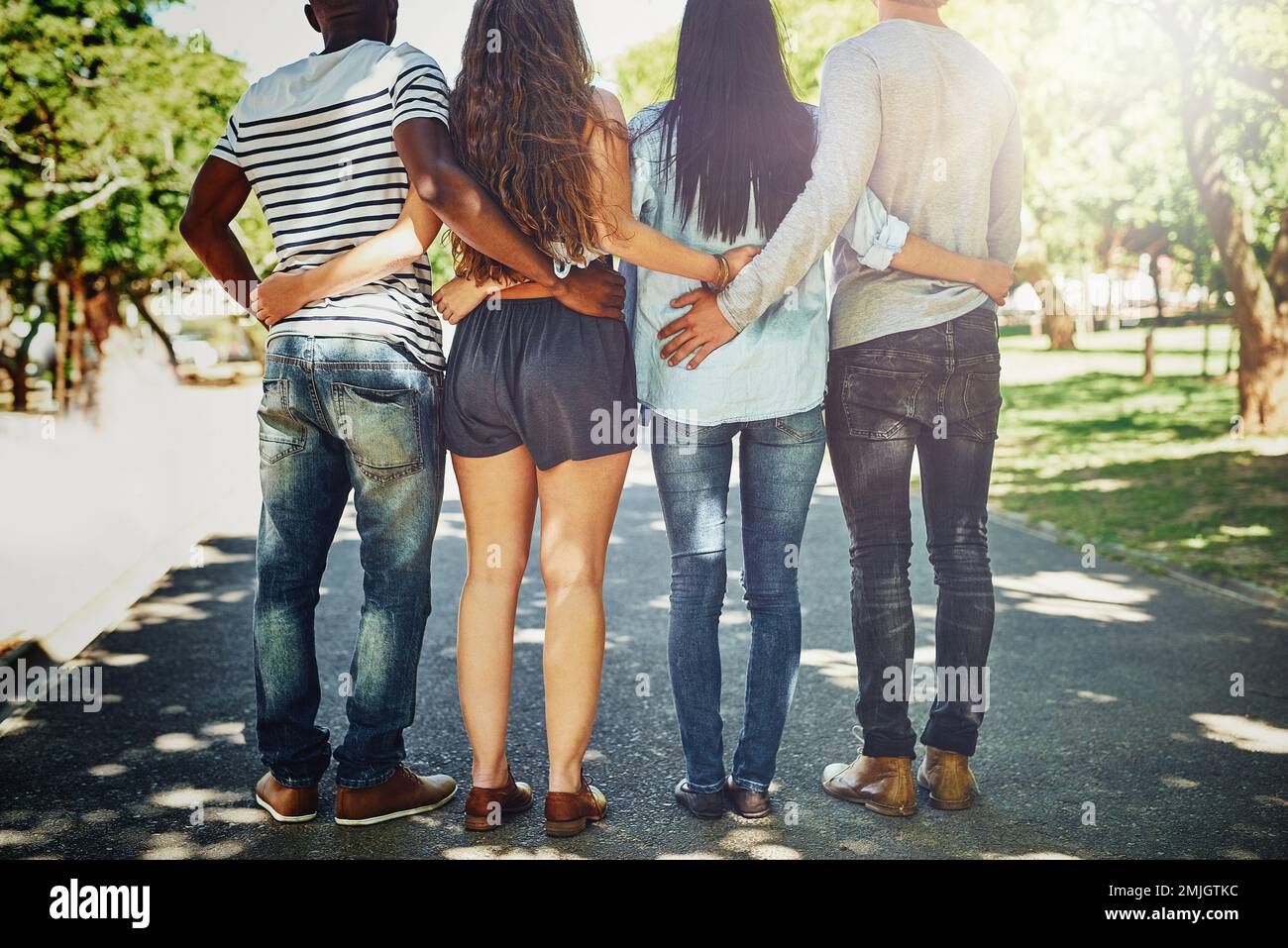 True friends support each other through life. Rearview shot of a group ...