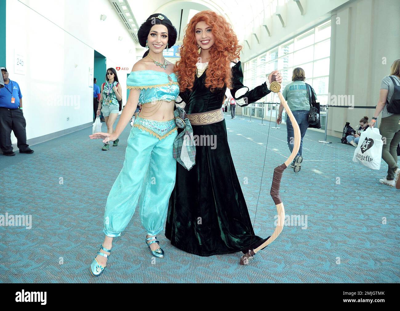 Andreas Hernandez, left, dressed as Princess Jasmine, and Giselle ...