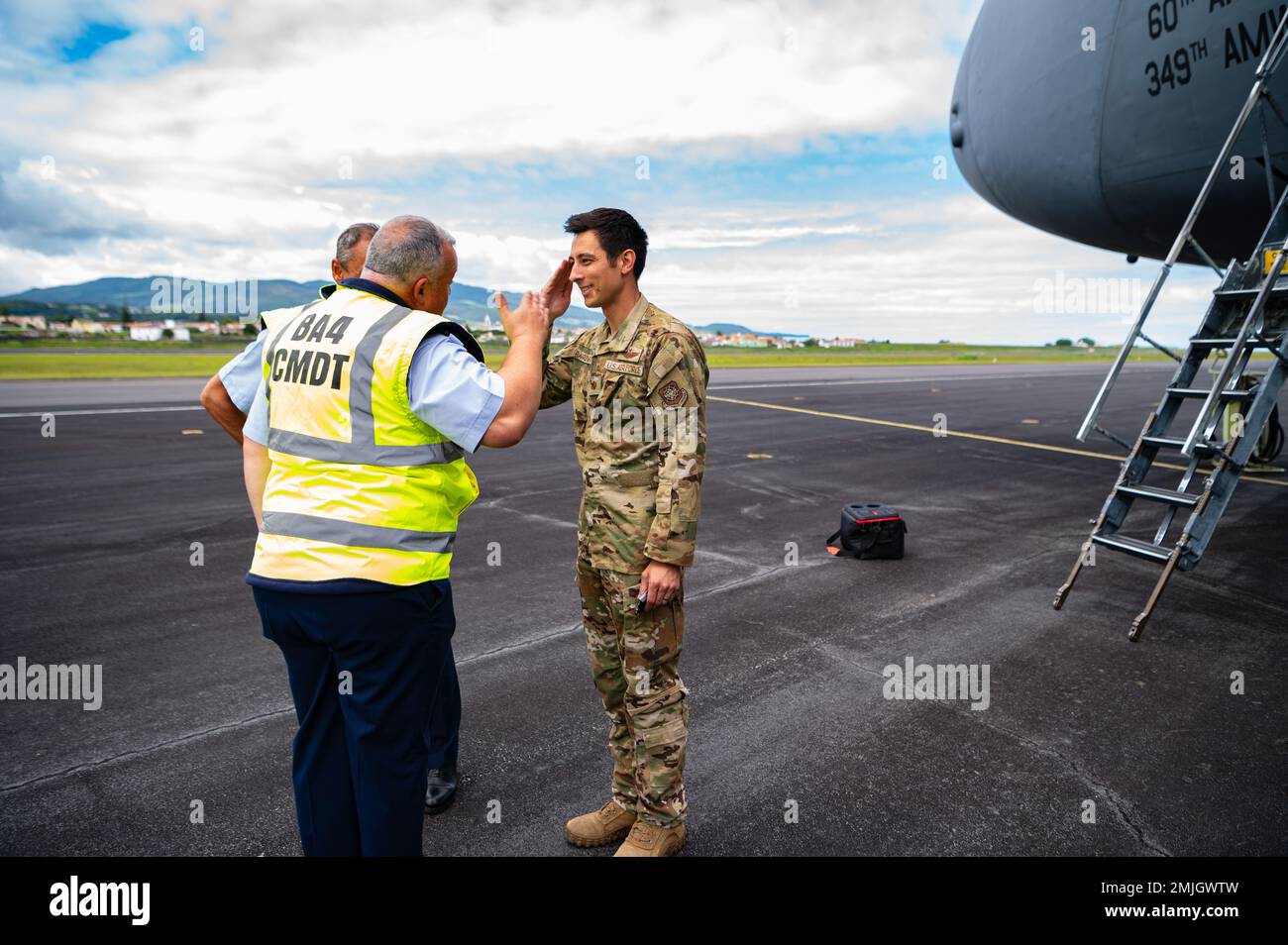 U.S. Air Force Maj. Zachary Barrington, right, 22nd Airlift Squadron C ...