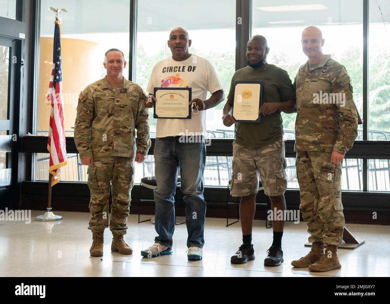 From left, Col. Ryan Hanson, garrison commander, Leonard Chatman, Doyen ...
