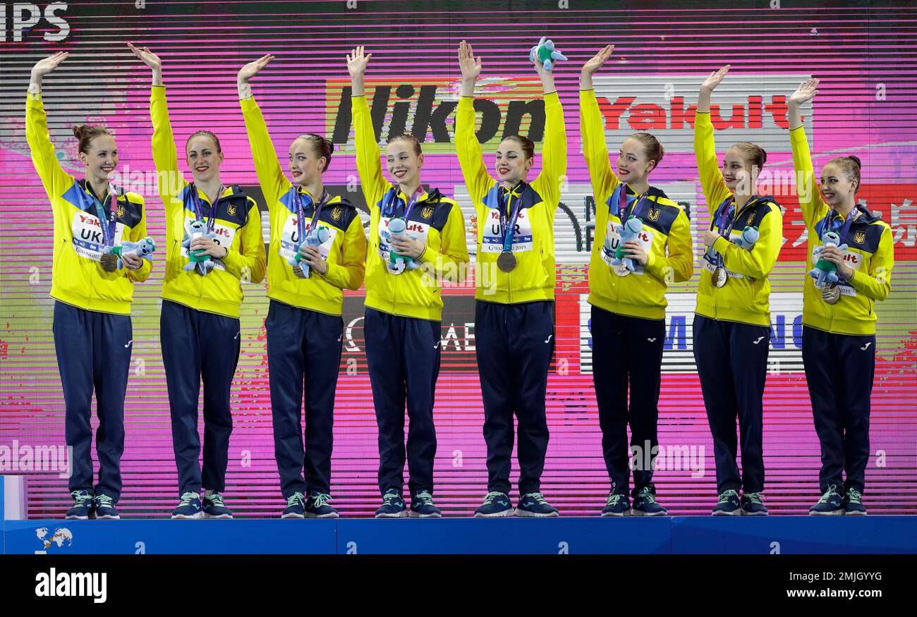 Ukraine celebrate on the podium after winning the bronze medal in the ...