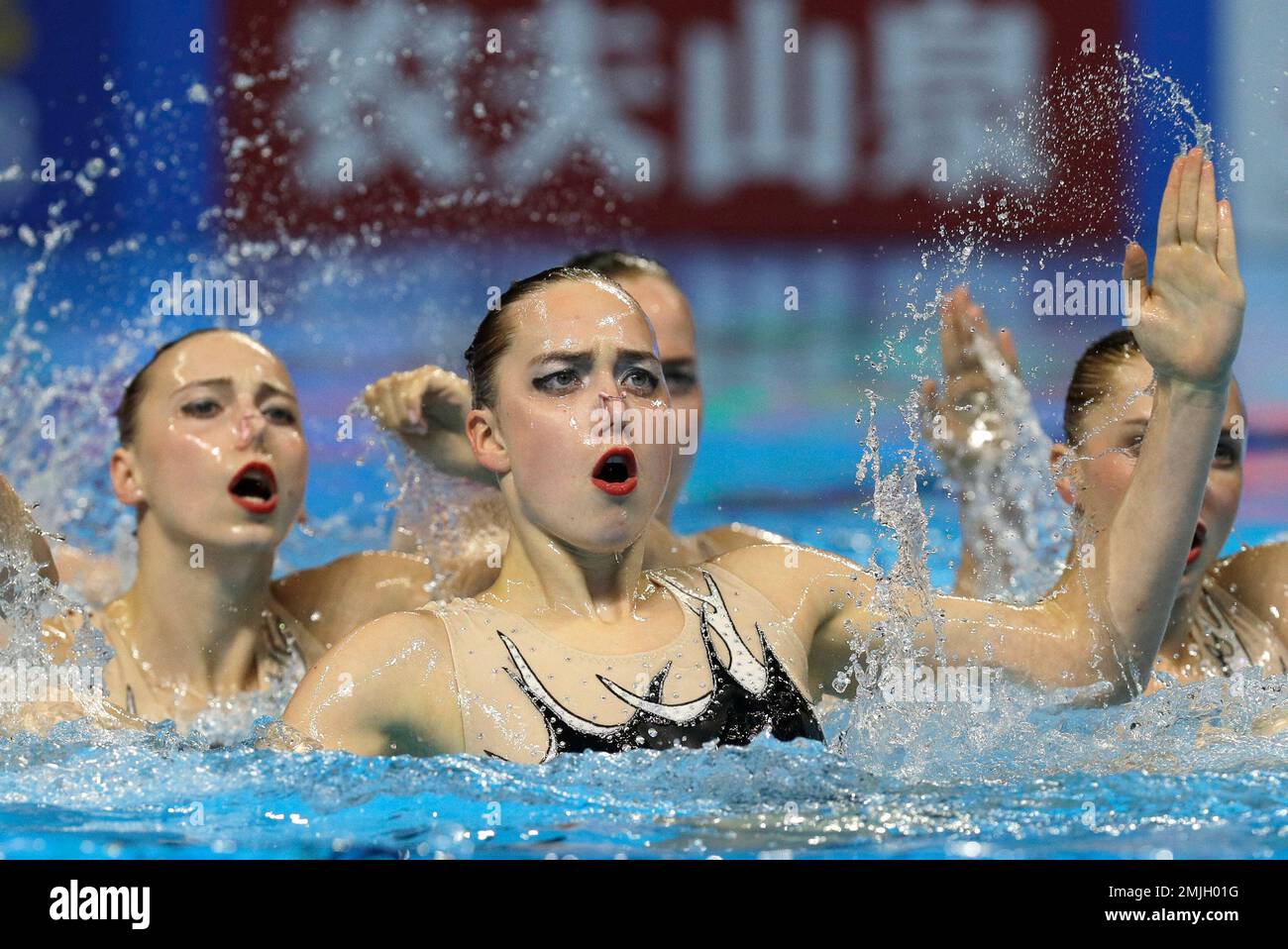 Ukraine perform their routine during the artistic swimming team free ...