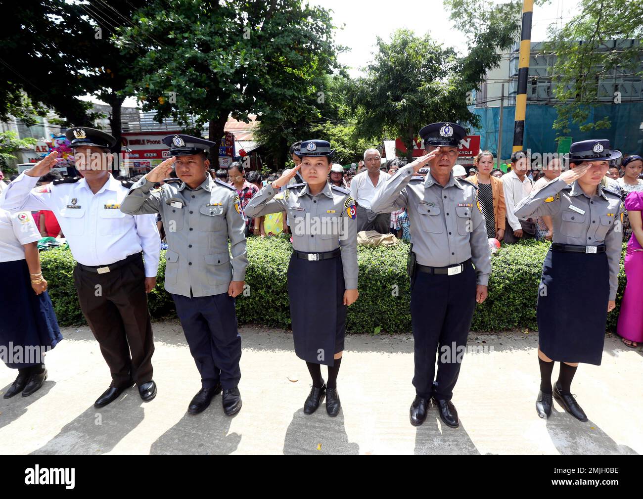 Myanmar police salute to the tomb of national hero Gen. Aung San during ...