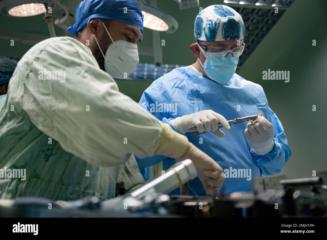 U.S. Air Force Lt. Col. Jacob Riis, an orthopedic surgeon assigned to ...