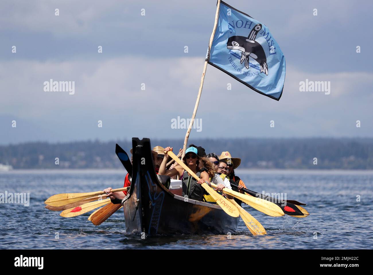 Members of the Snohomish Tribe of Indians pull for shore during a stop ...