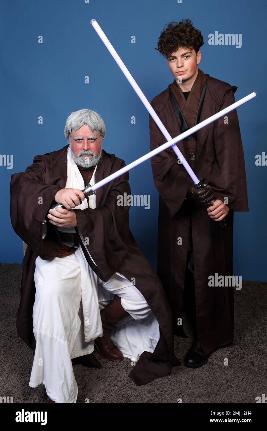 William Pasini, left, dressed as Obi-Wan Kenobi and Mario Pasini ...