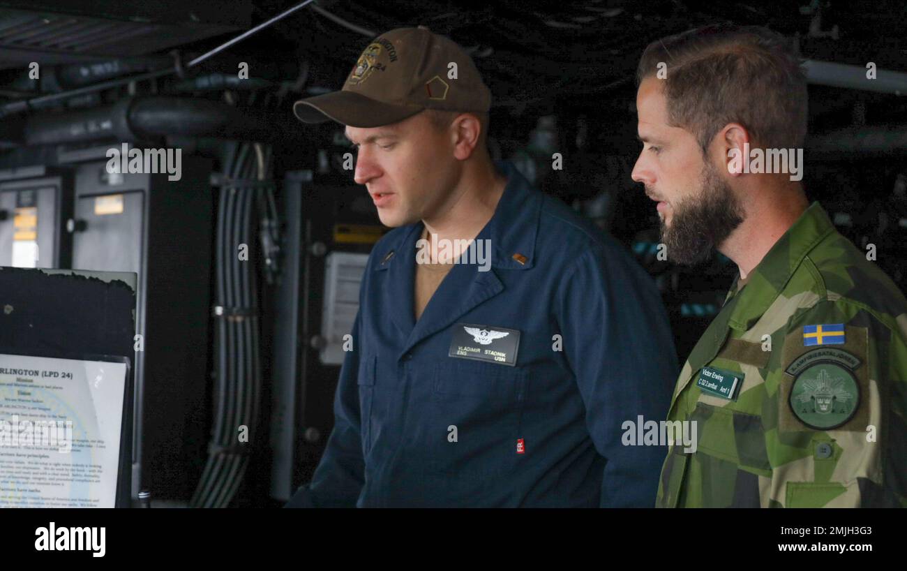 U.S. Navy Ensign Vladimir Stadnik, assigned to the San Antonio-class ...