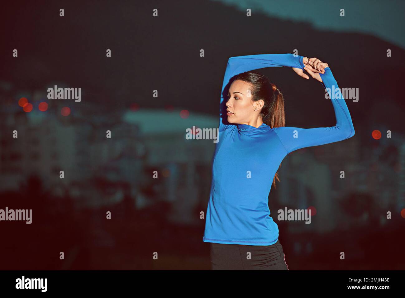 Warm-up to prepare your body before starting. a sporty young woman ... Warm-up to prepare your body before starting. a sporty young woman ...