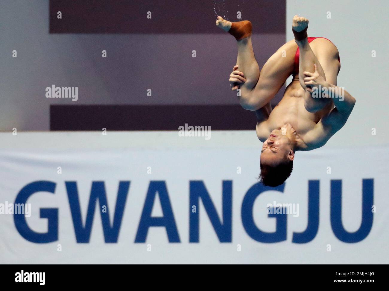 China's Xie Siyi performs his routine in the men's 3m springboard ...