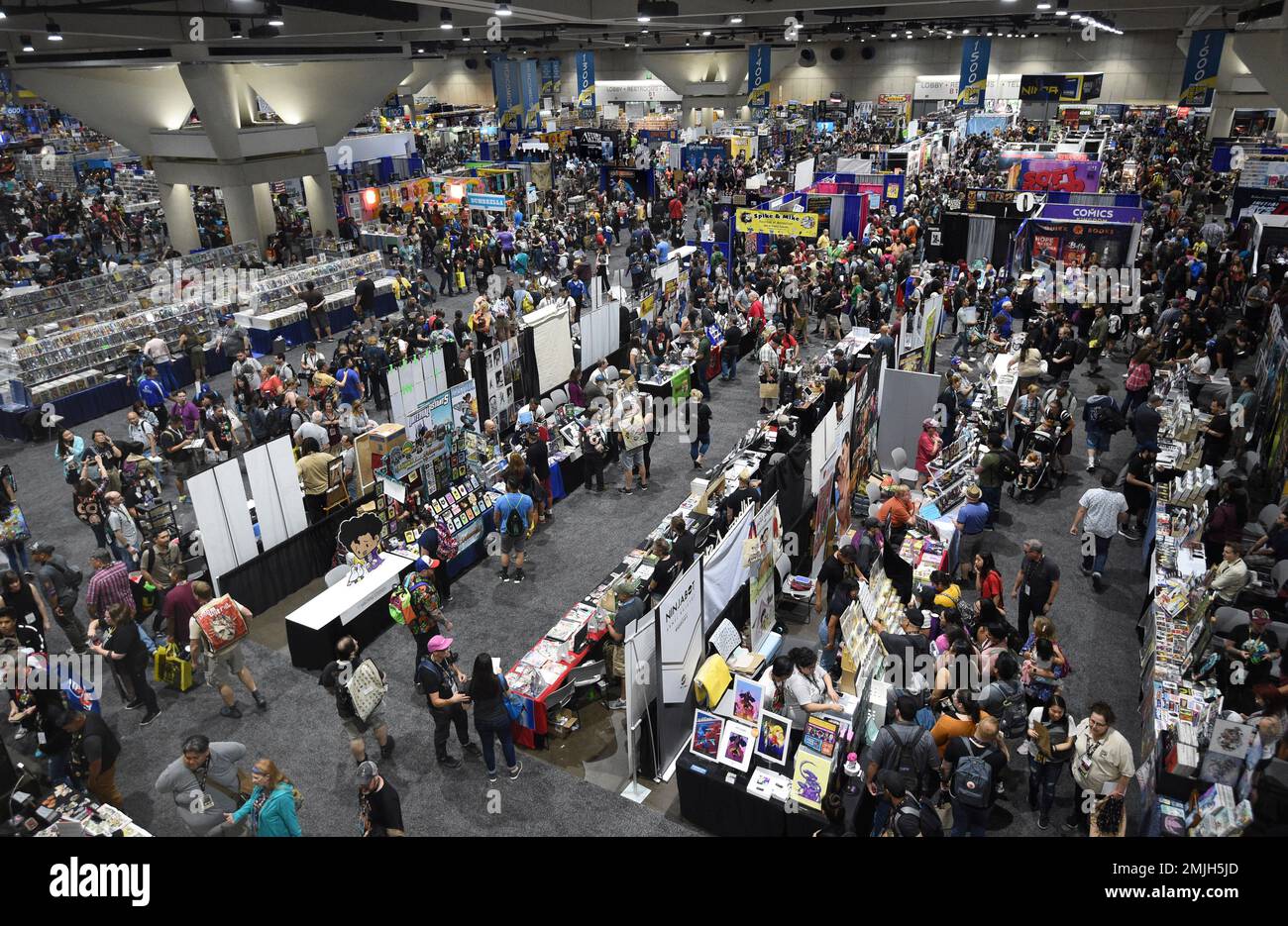 Comic-Con attendees walk the floor during Preview Night at the 2019 ...