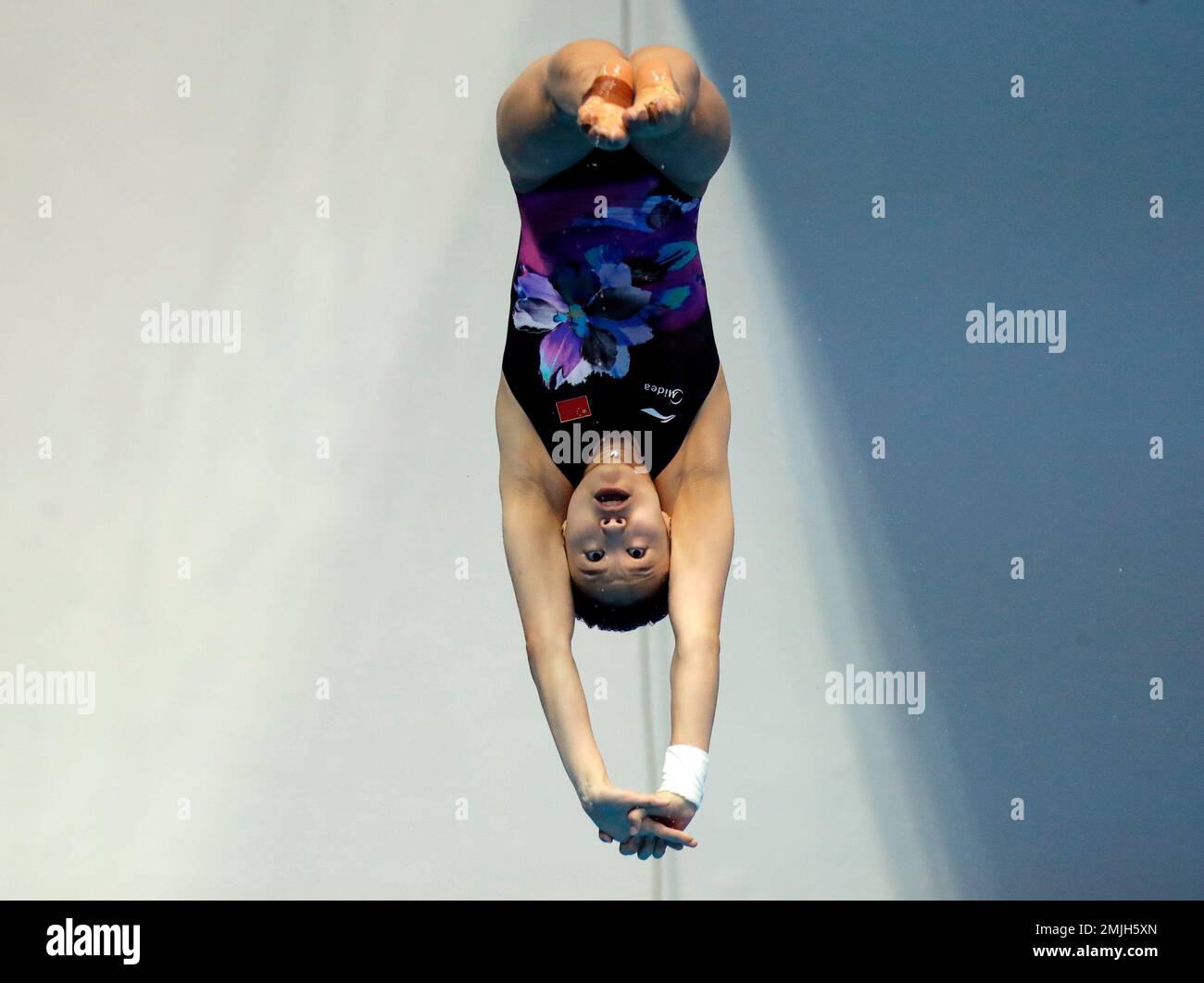 China's Wang Han performs her routine in the women's 3m springboard ...