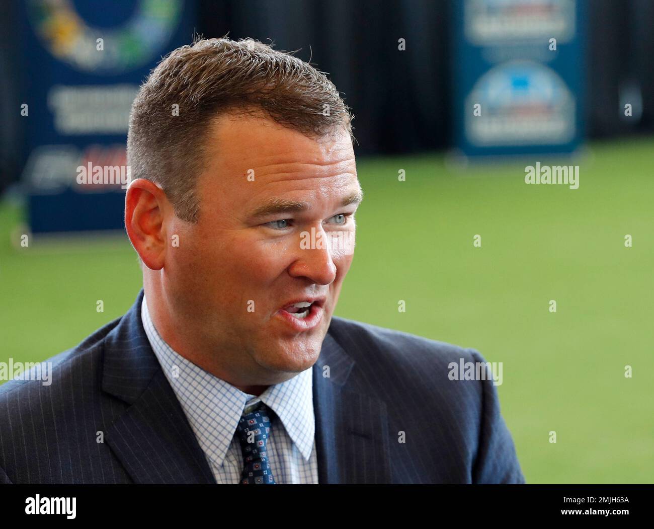 Rice coach Mike Bloomgren talks with reporters during the Conference ...