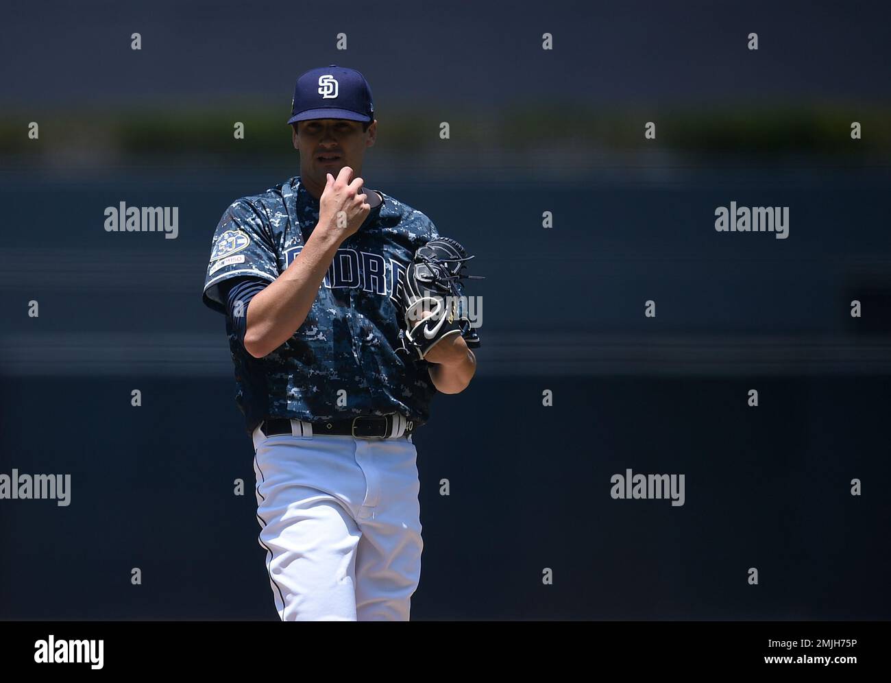 San Diego Padres starting pitcher Cal Quantrill reacts after a pitch ...