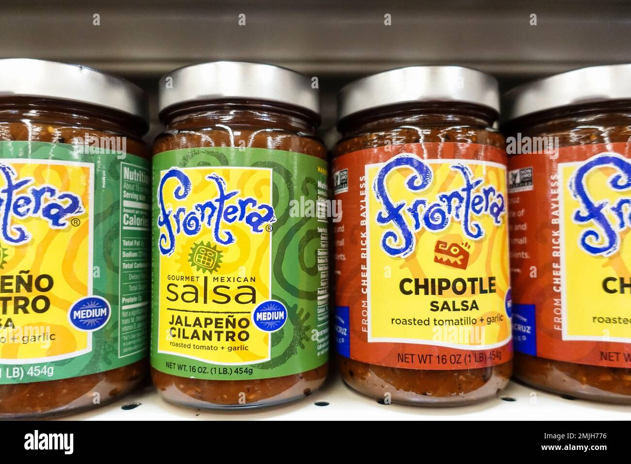 Jarred salsas by Frontera, a Conagra brand, rest on a supermarket shelf ...