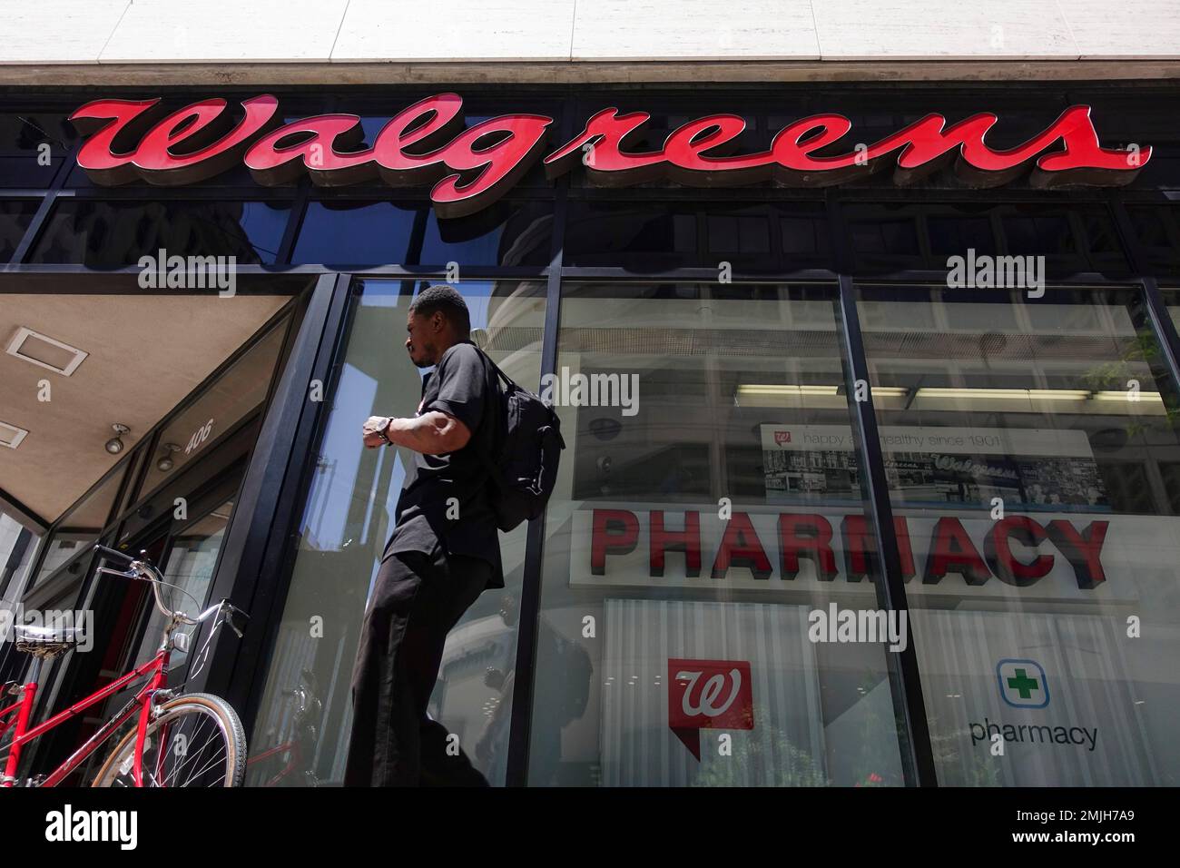 Signage hangs outside a Walgreens pharmacy, Tuesday, June 25, 2019, in ...