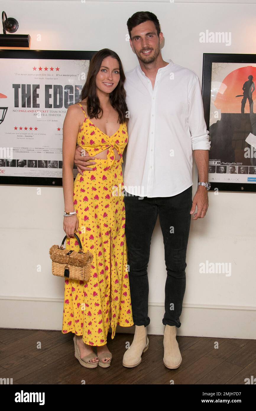 Cricketer Steven Finn and partner Amber pose for photographers upon ...