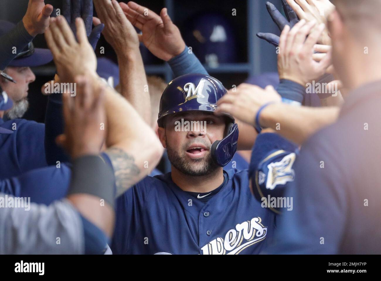 Milwaukee Brewers' Manny Pina celebrates after hitting a two-run home ...