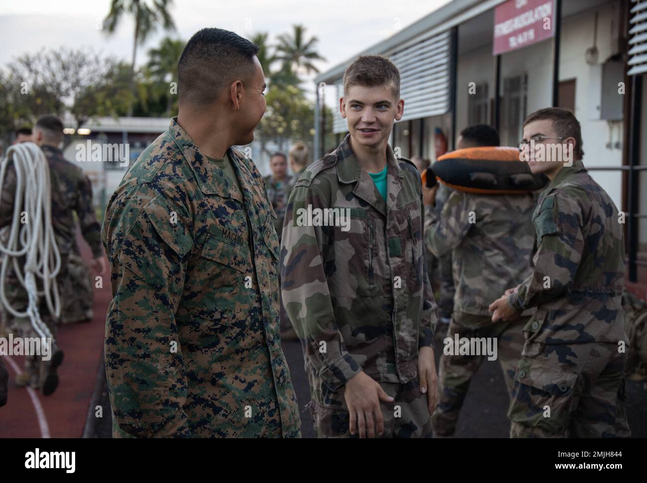 U.S. Marine Corps Cpl. Leonardo Macedo Jr., left, accounting chief ...