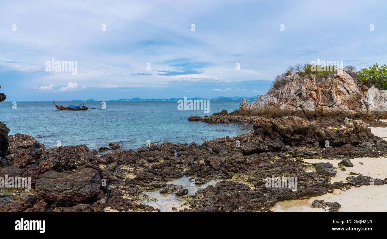 The egg island climbing cliff bay Stock Photo - Alamy
