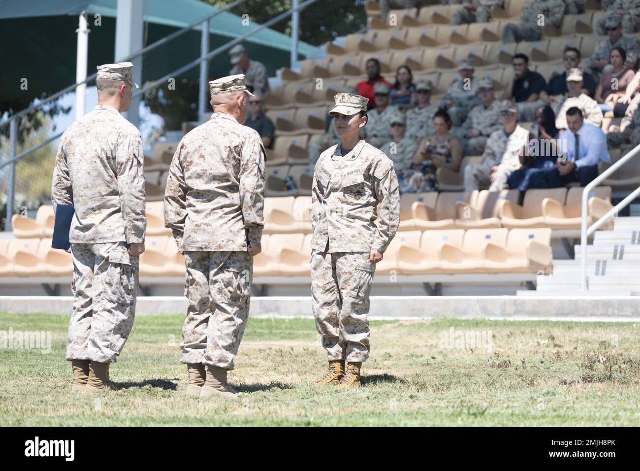 U.S. Marine Corps Sgt. Leilana TupuaRodriguez receives the Jim ...