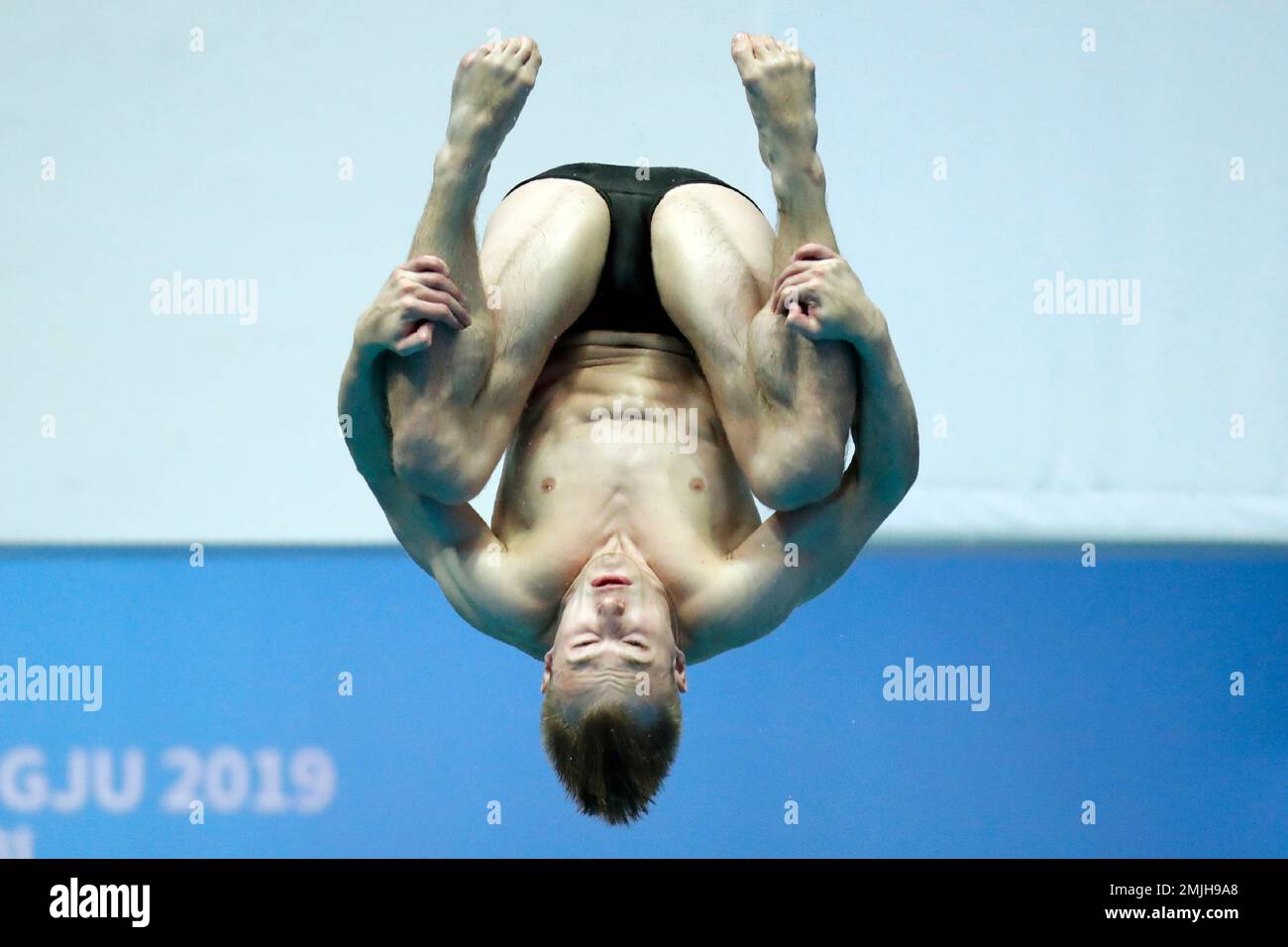 Woo Haram of South Korea competes in the semifinals of men's 3-meter ...