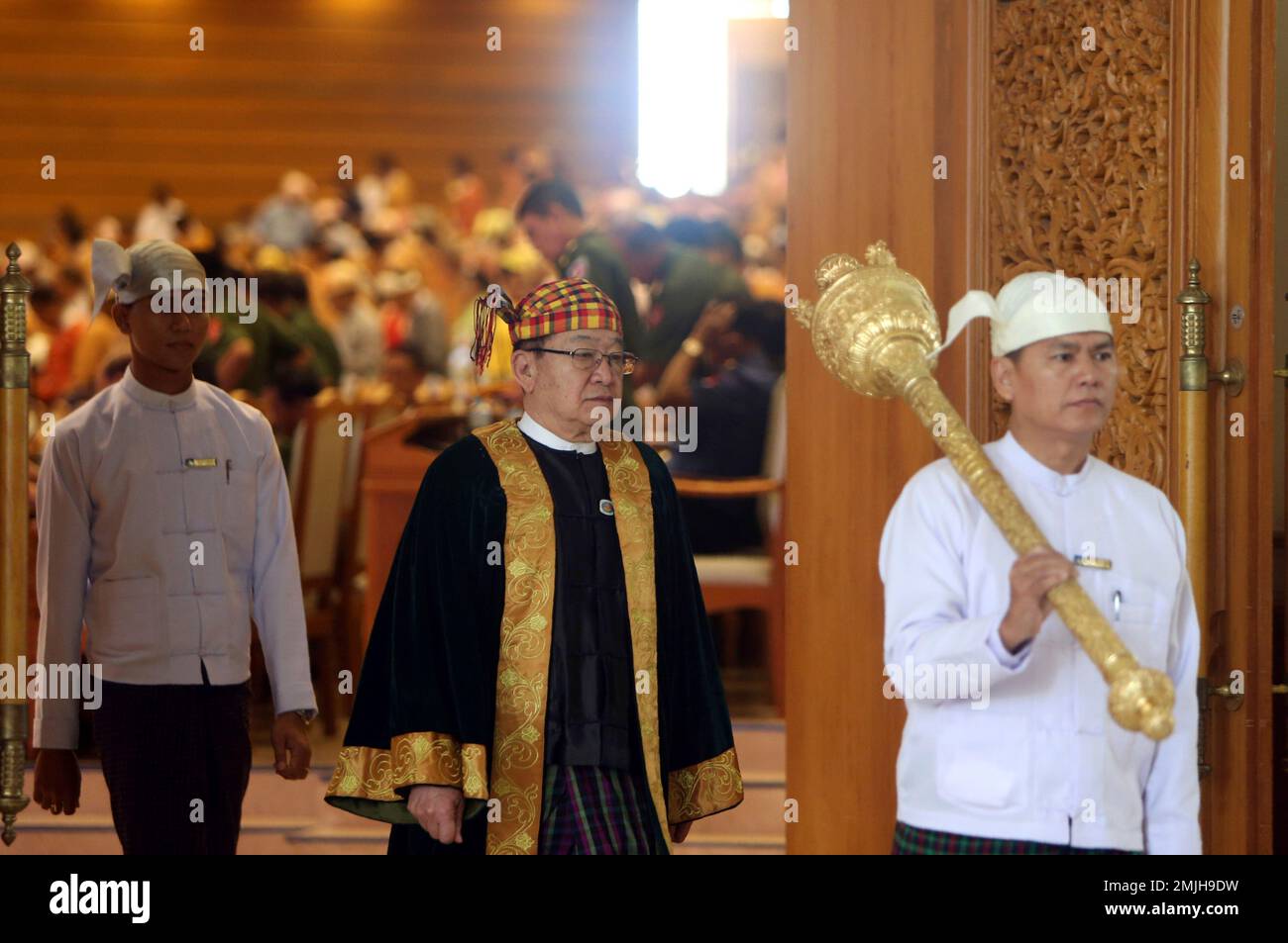 Myanmar's Parliament Chairman T Khun Myat, center, leaves after a ...