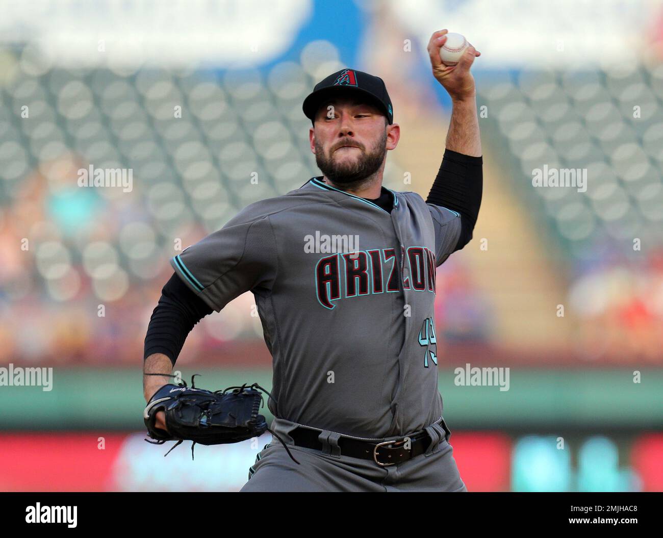 Arizona Diamondbacks starting pitcher Alex Young (49) delivers against ...