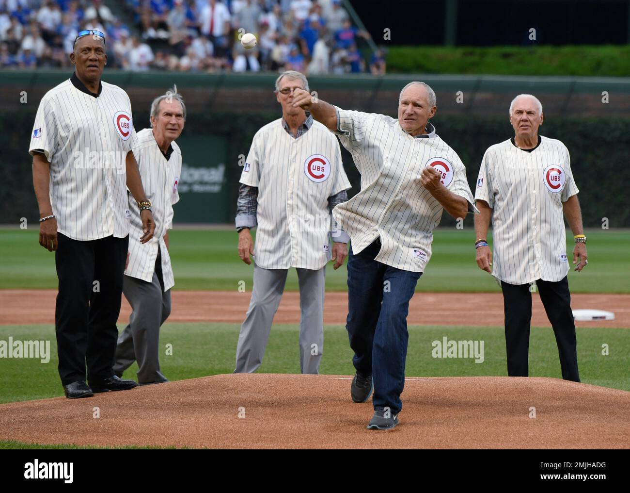 Ken Rudolph, catcher for the 1969 Chicago Cubs, throws out a ceremonial ...