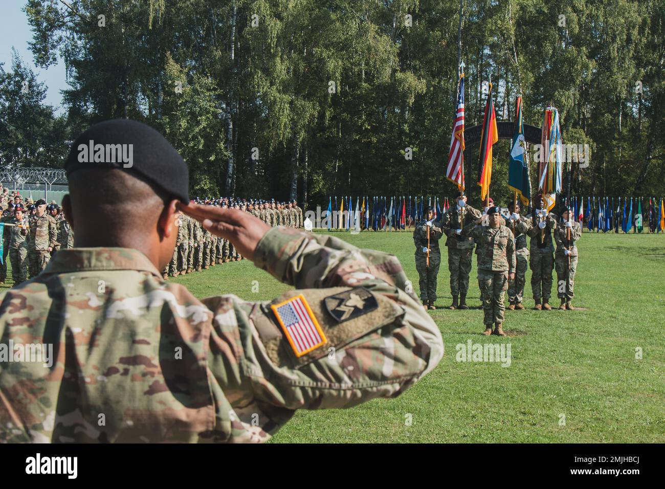 Command Sgt. Maj. James R. Holmes III and graduates of class 09-22 of ...
